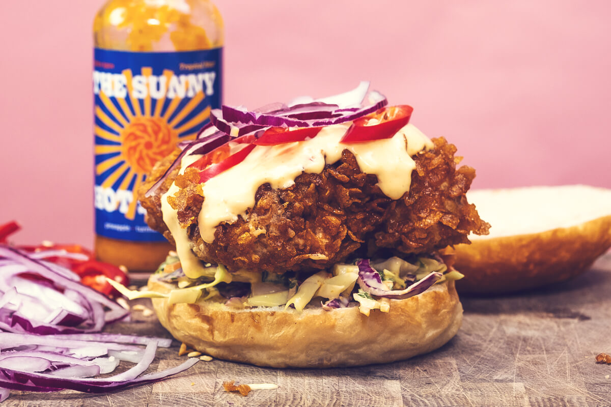 Indian Fried Chicken Burger met The Sunny hot sauce - Heatsupply